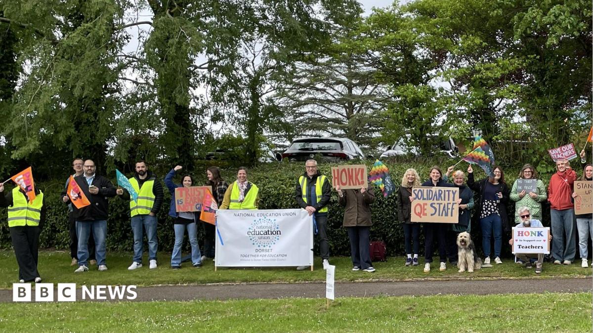 Two Dorset schools staff strike over planned front line cuts - BBC News