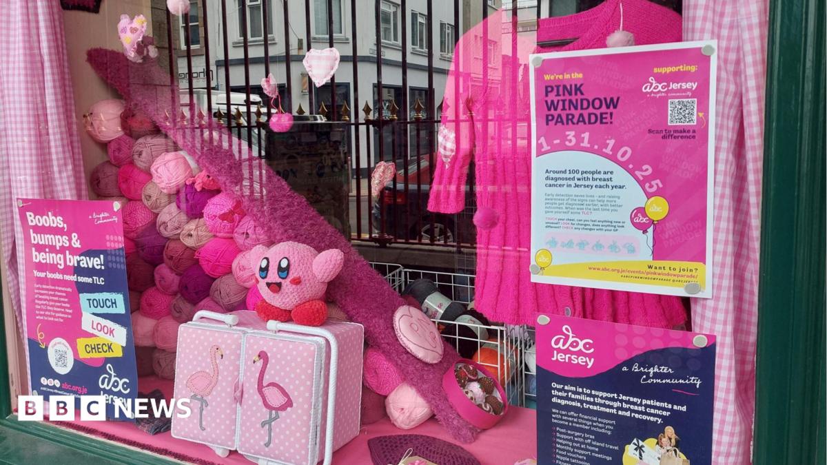 Jersey window displays decorated pink for breast cancer awareness - BBC ...