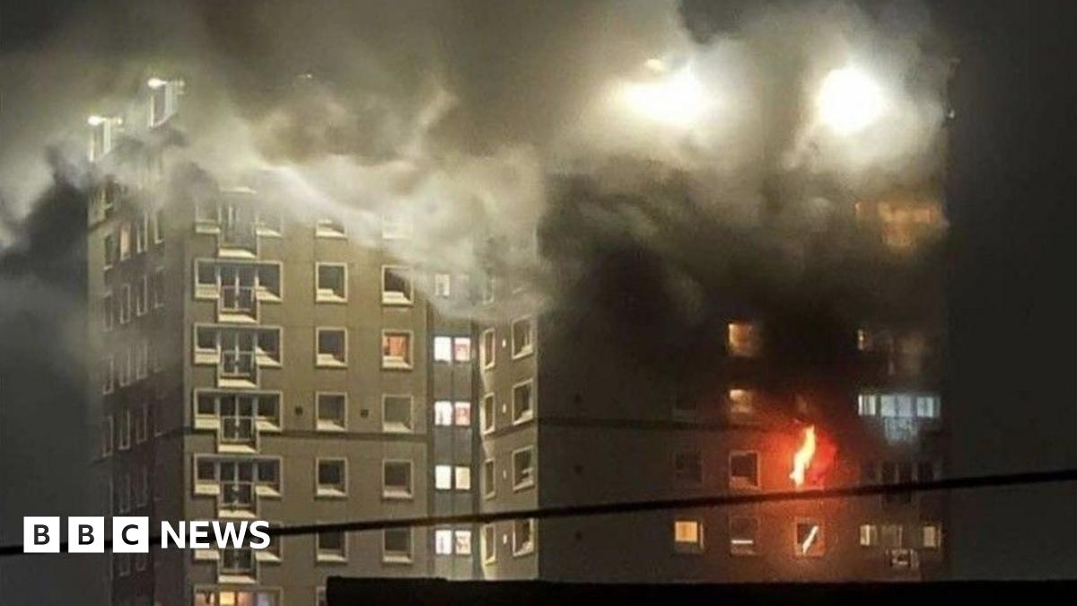 Man dies after falling from window during tower block fire - BBC News