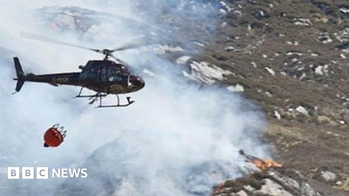 Crews continue to battle wild fires across Scotland - BBC News