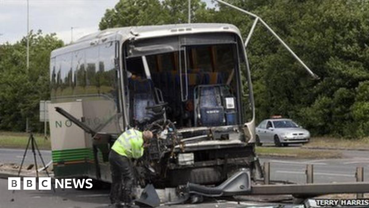 Driver badly hurt in Peterborough coach crash - BBC News