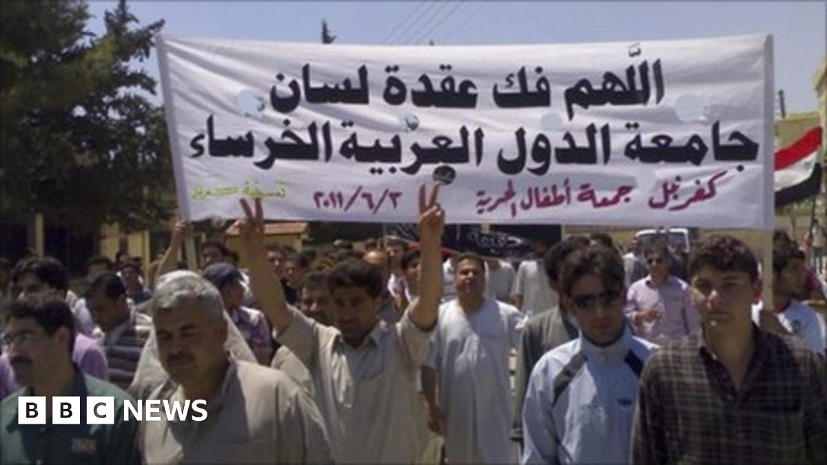 Syria: 'Dozens killed' as thousands protest in Hama - BBC News