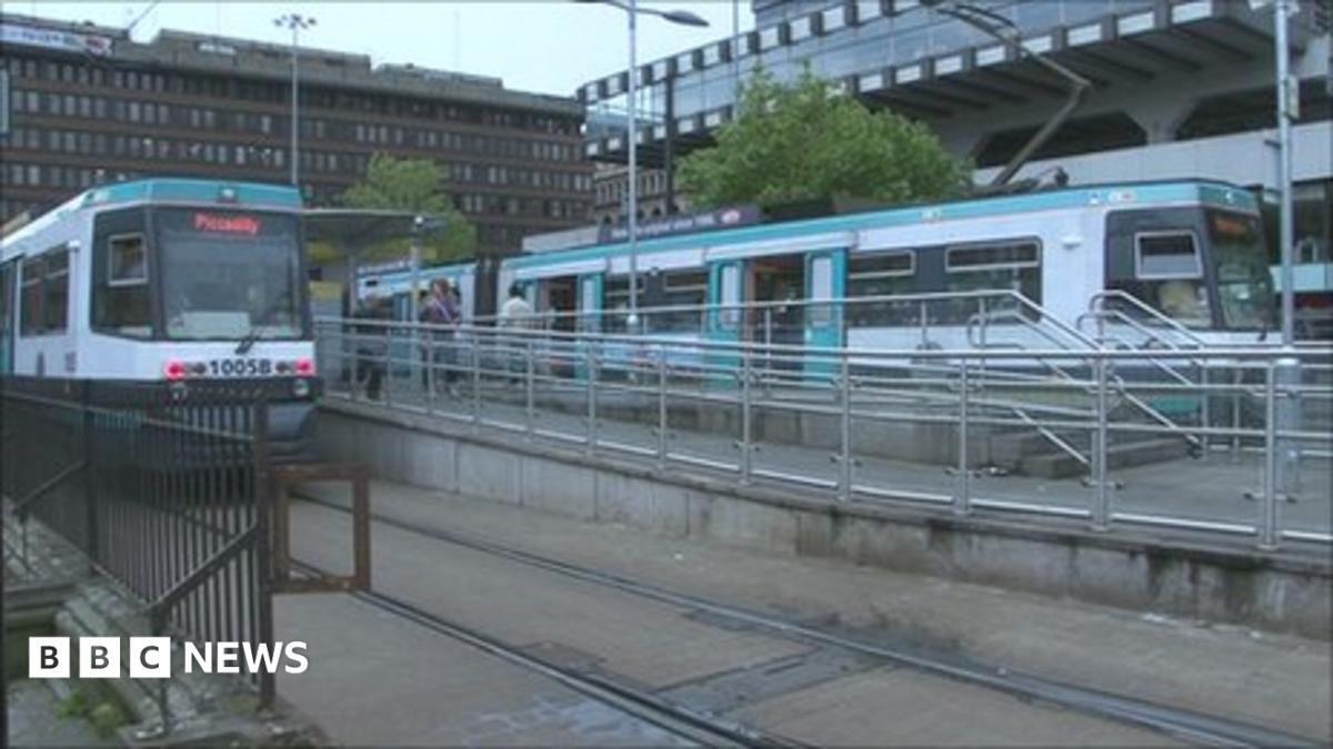 Man hit by Manchester tram is critically injured - BBC News