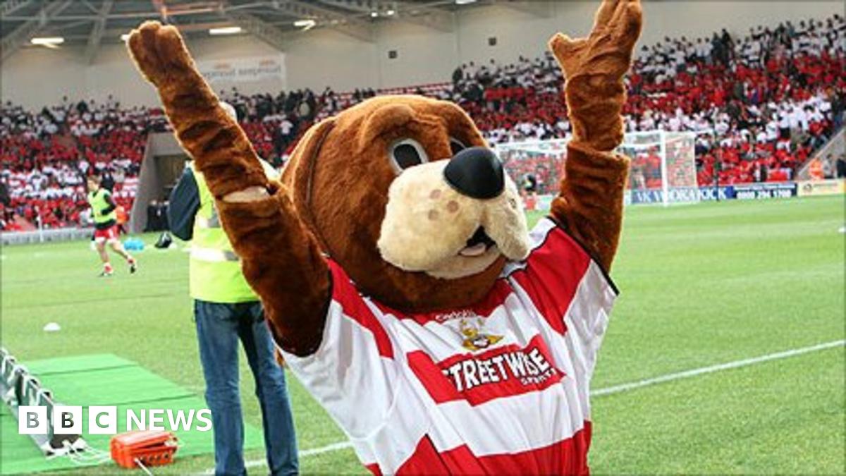 Doncaster Rovers' Donny Dog underwear pose mascot reinstated - BBC News