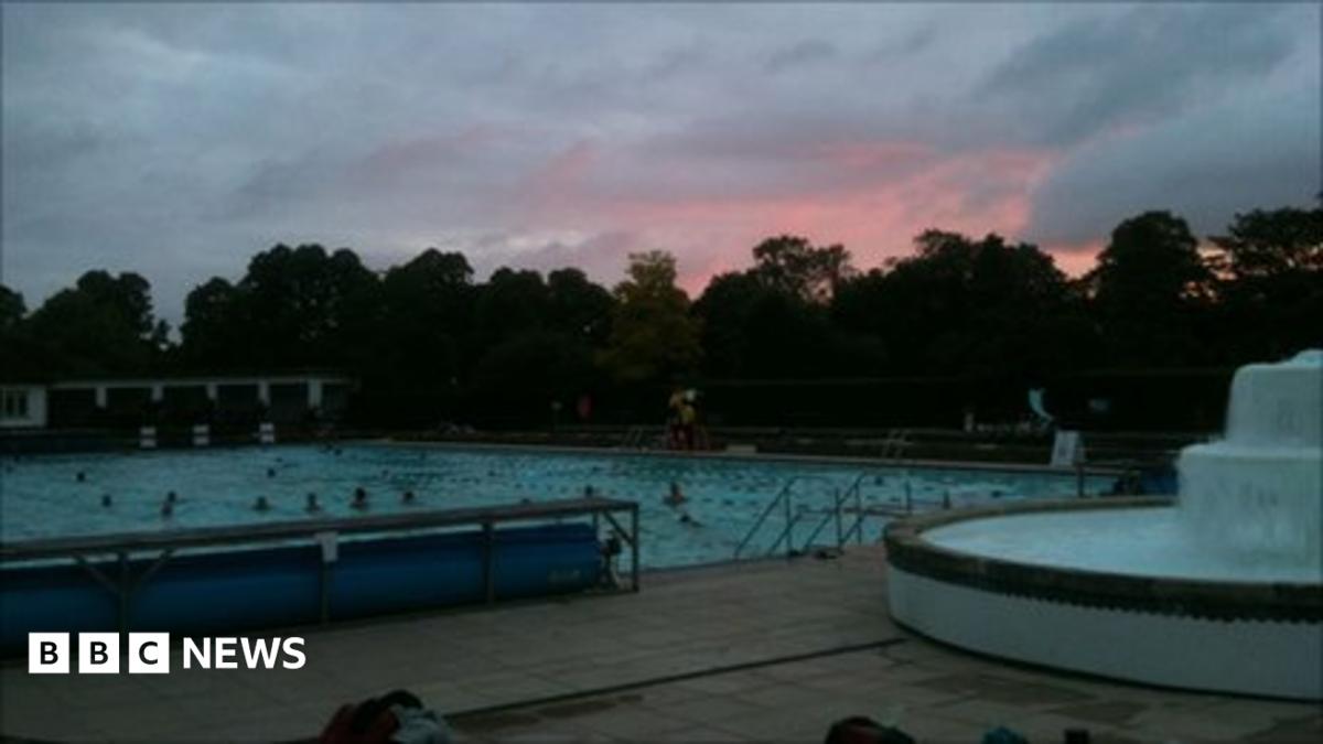 Summer solstice sunrise swim takes place in Cheltenham - BBC News