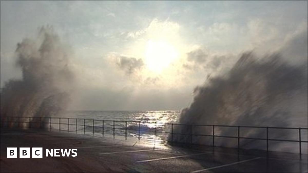 £8.3m tidal flood defences open in east Devon - BBC News