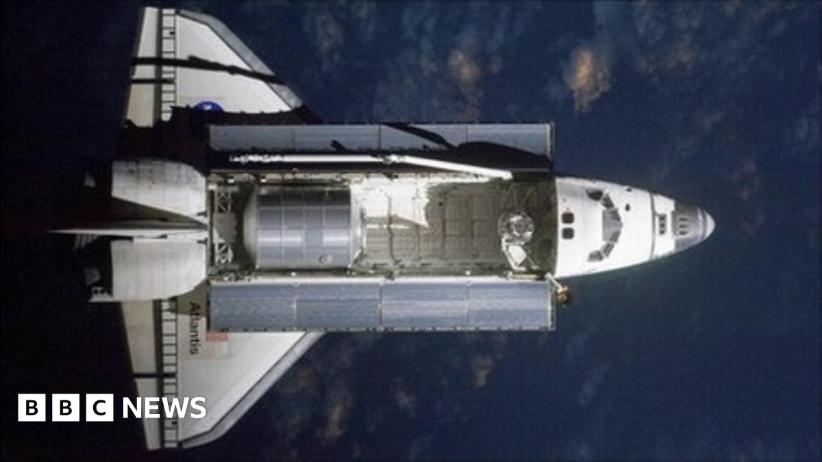 Last shuttle era spacewalk over - BBC News