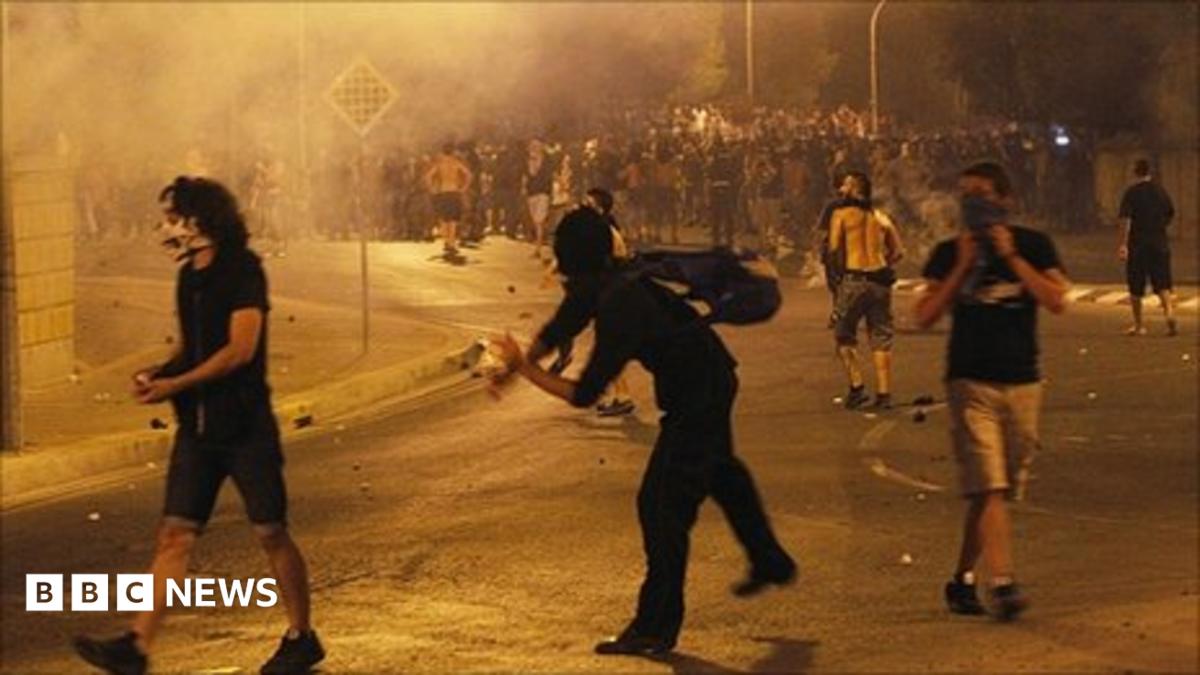 Cyprus protest over deadly blast at navy base - BBC News