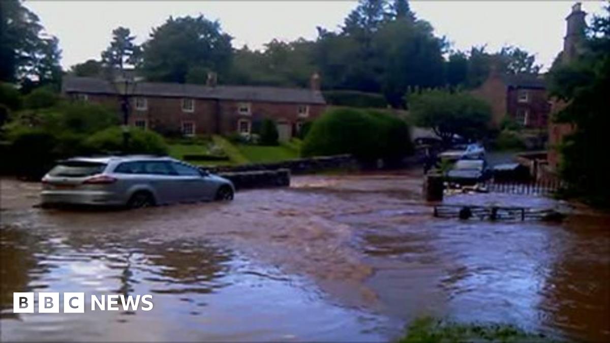 Great Corby bridge collapses in flash floods - BBC News
