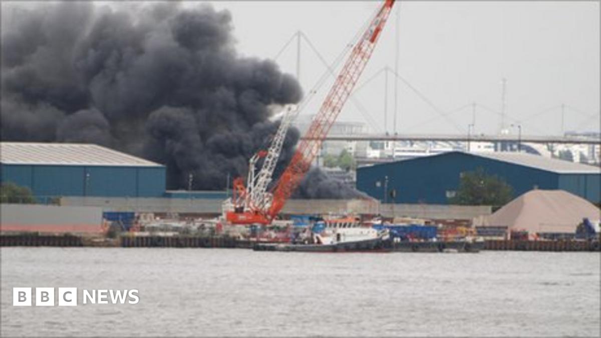 DLR suspended by Canning Town recycling plant fire - BBC News