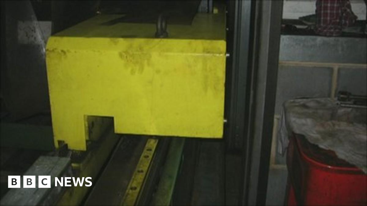 Companies fined after man dragged through machine - BBC News