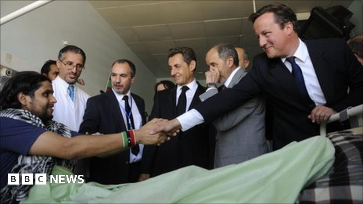 Libya conflict: Cameron and Sarkozy visit Tripoli - BBC News