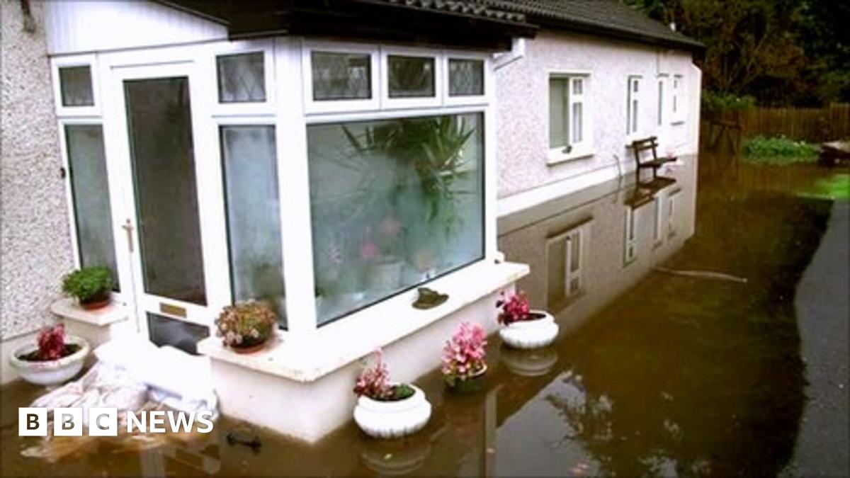Elderly woman rescued in Antrim flooding - BBC News