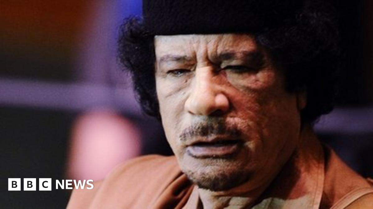 Row over Muammar Gaddafi's body delays burial plans - BBC News