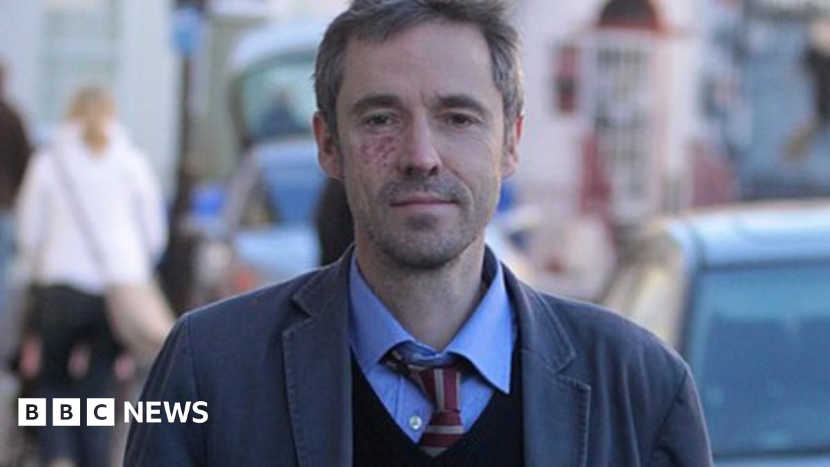 Man denies attacking ex-News of the World reporter in Kent - BBC News
