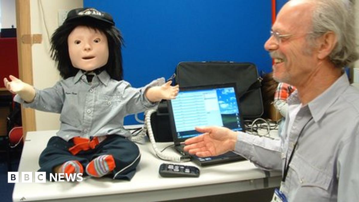 Robot at Hertfordshire University aids autistic children - BBC News