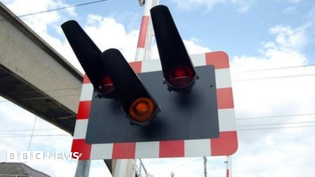 Open crossing barrier plan for Ayrshire and Highlands - BBC News