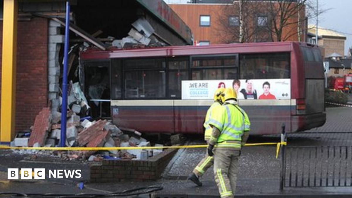 Bus crashes into Hamilton petrol station - BBC News