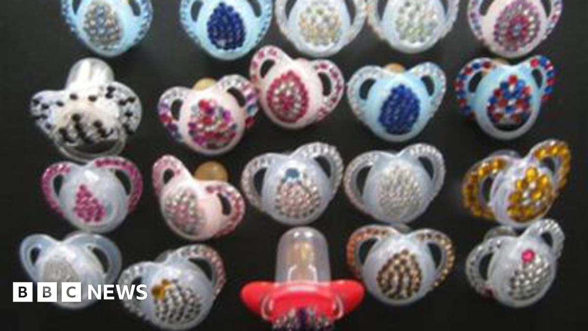 'Bling' dummies choking fear, warns Flintshire trading standards - BBC News