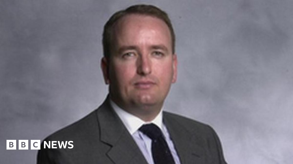 Conservative MP resigns party post in policy protest - BBC News