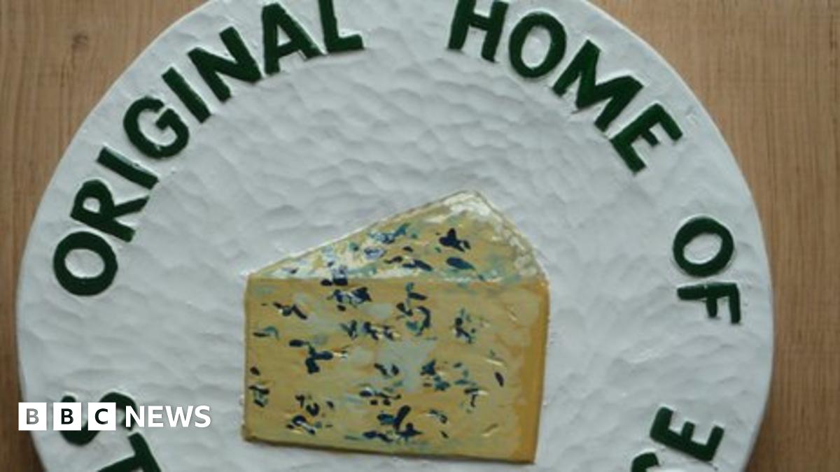 A sign claims Stilton in Cambridgeshire is home to Stilton cheese - BBC ...