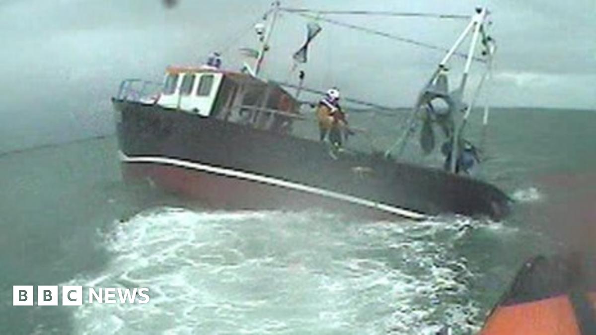 Skipper and crewman rescued from sinking Portsmouth trawler - BBC News