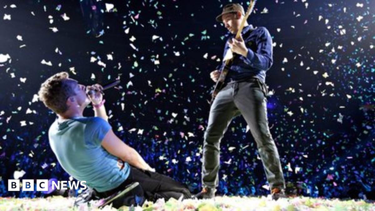 Jonny Buckland gives Coldplay disc to Pantymwyn village hall ...