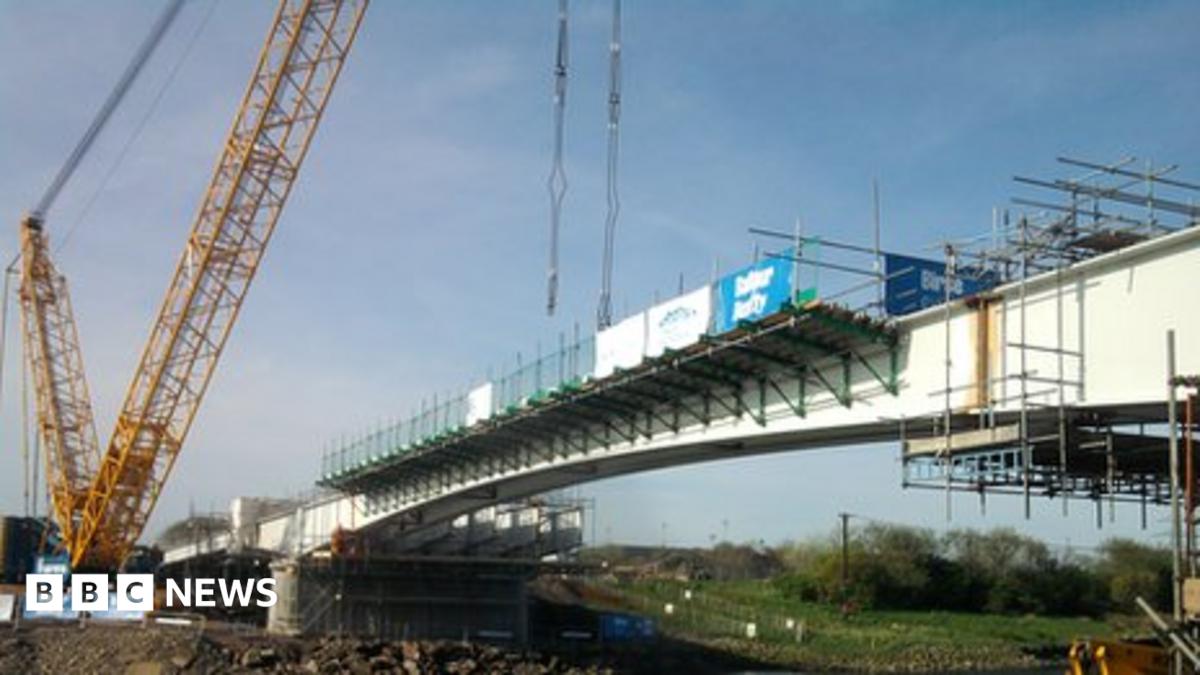 First beam installed on flood-hit Northside Bridge replacement - BBC News