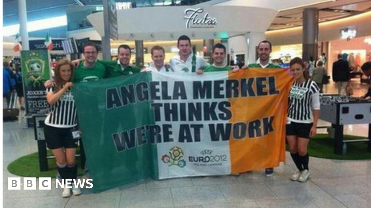Irish footie fans: 'Angela Merkel thinks we're at work' - BBC News