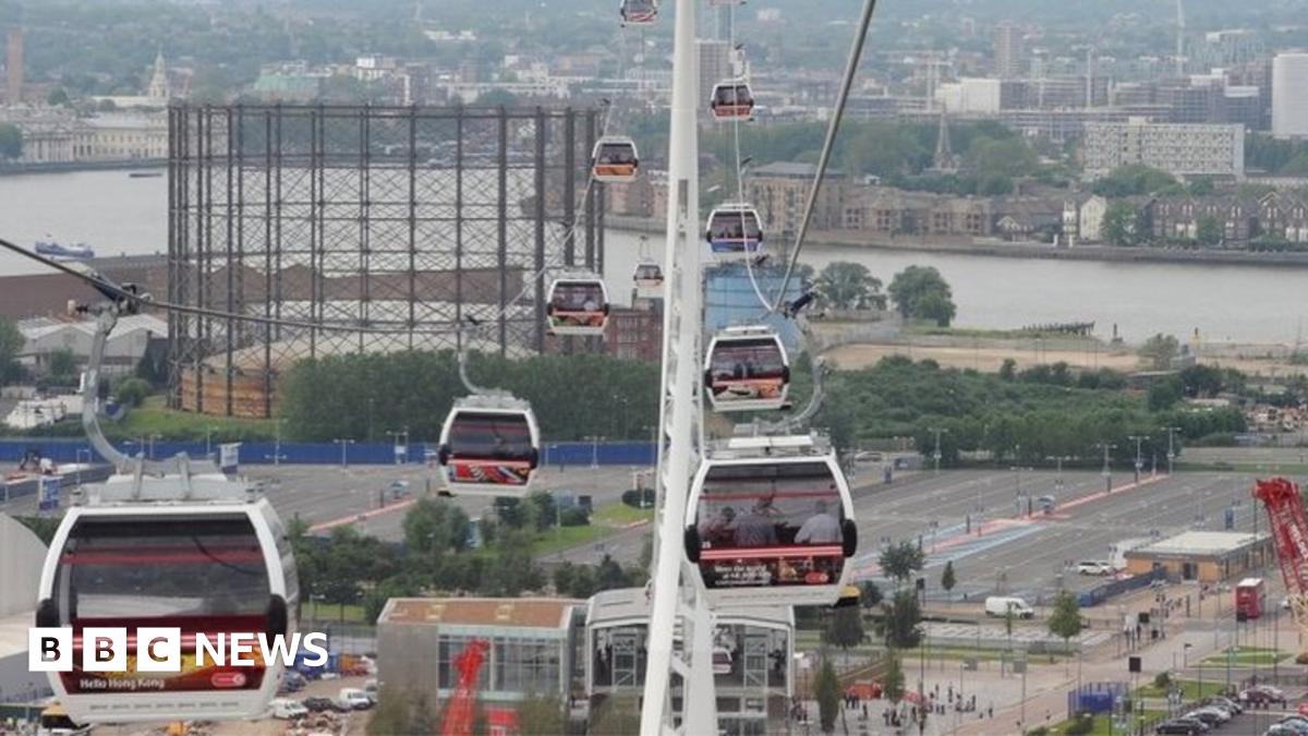 Thames cable car in London opens for passengers - BBC News