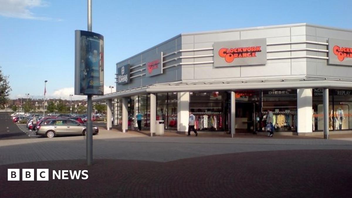 Junction One shopping centre value halved - BBC News
