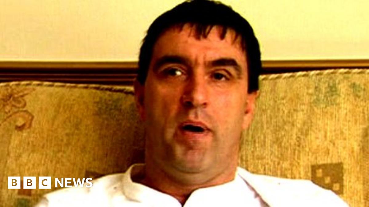 Son questioned over parents' murder in Sale - BBC News