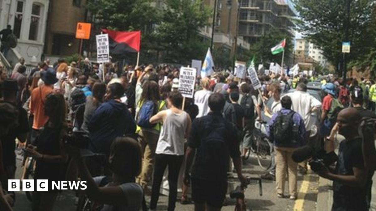 Hundreds march in Olympics protest in east London - BBC News
