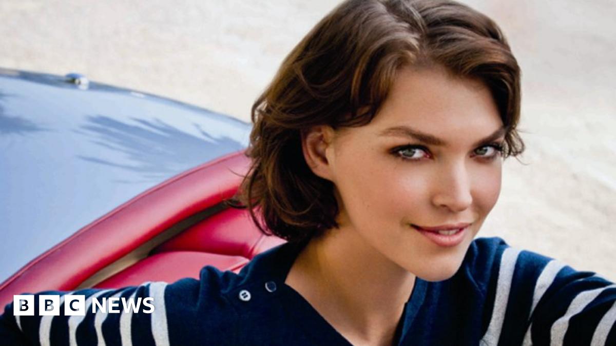 Next posts rise in profits but warns of weaker sales - BBC News