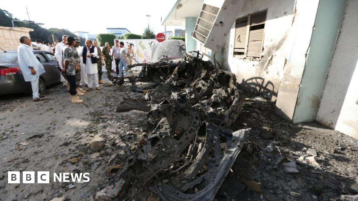 Libya holds 32 'Gaddafi loyalists' over Tripoli attack - BBC News