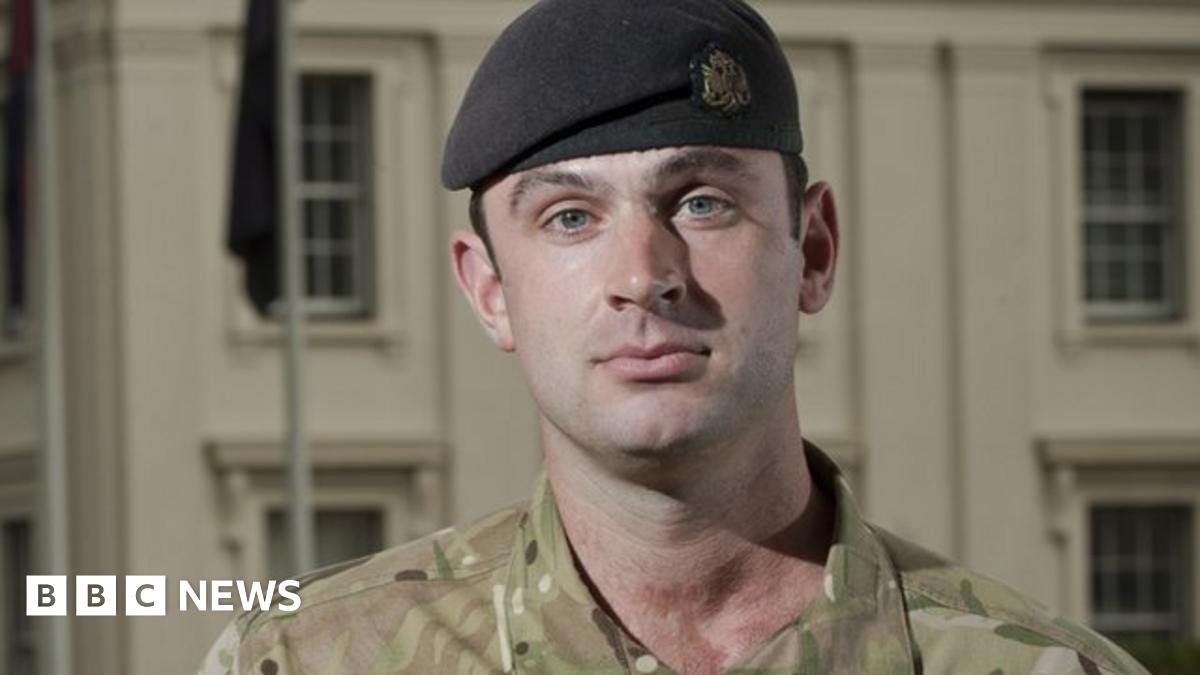 Honoured soldier Nick Garland 'battled back from coma' - BBC News
