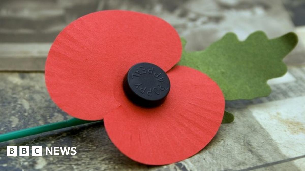 Poppy seller burned in aerosol attack in Manchester - BBC News