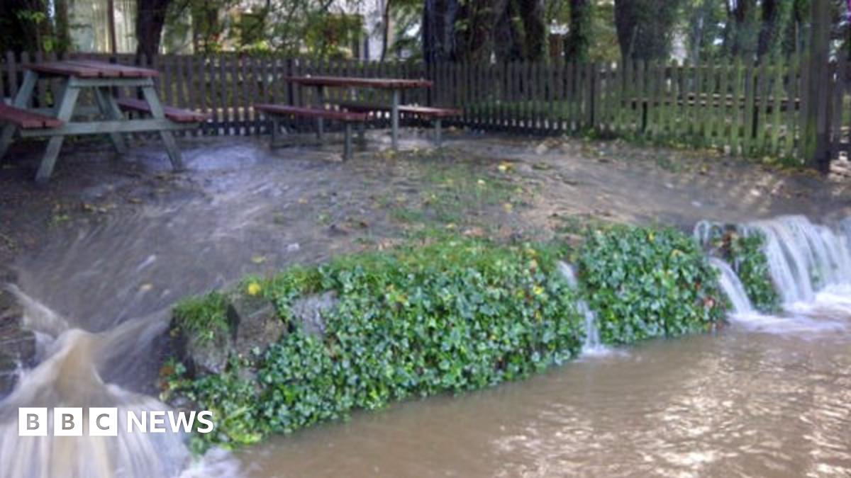 Cheddar starts storm clear-up as more rain is forecast - BBC News