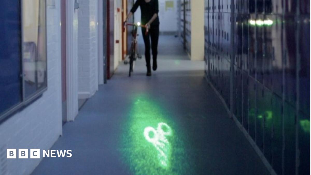 Laser-projected bike light invented to improve safety - BBC News
