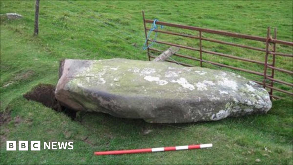 Bedd Morris: Bronze Age stone back after car crash - BBC News