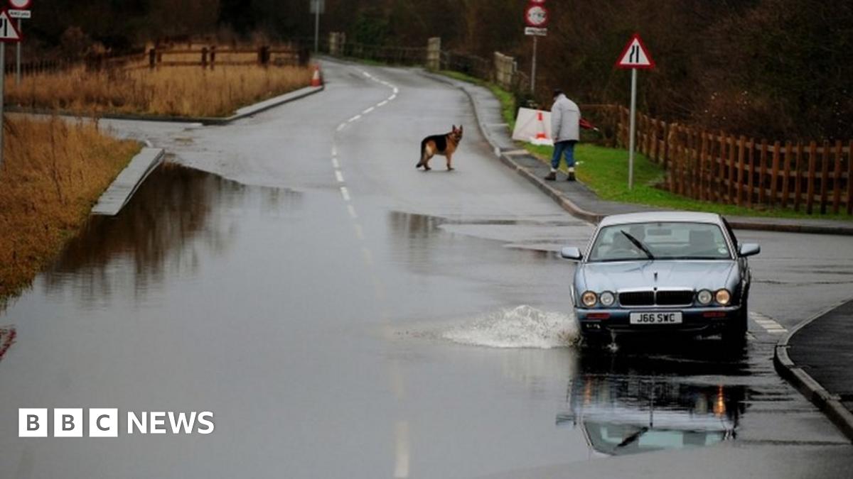 Flood warnings remain as wet weather continues - BBC News