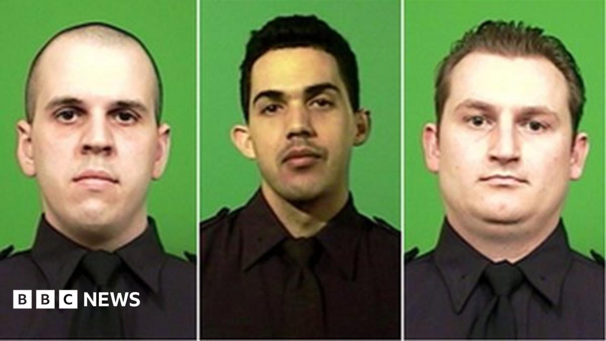 Three New York police officers shot and wounded - BBC News