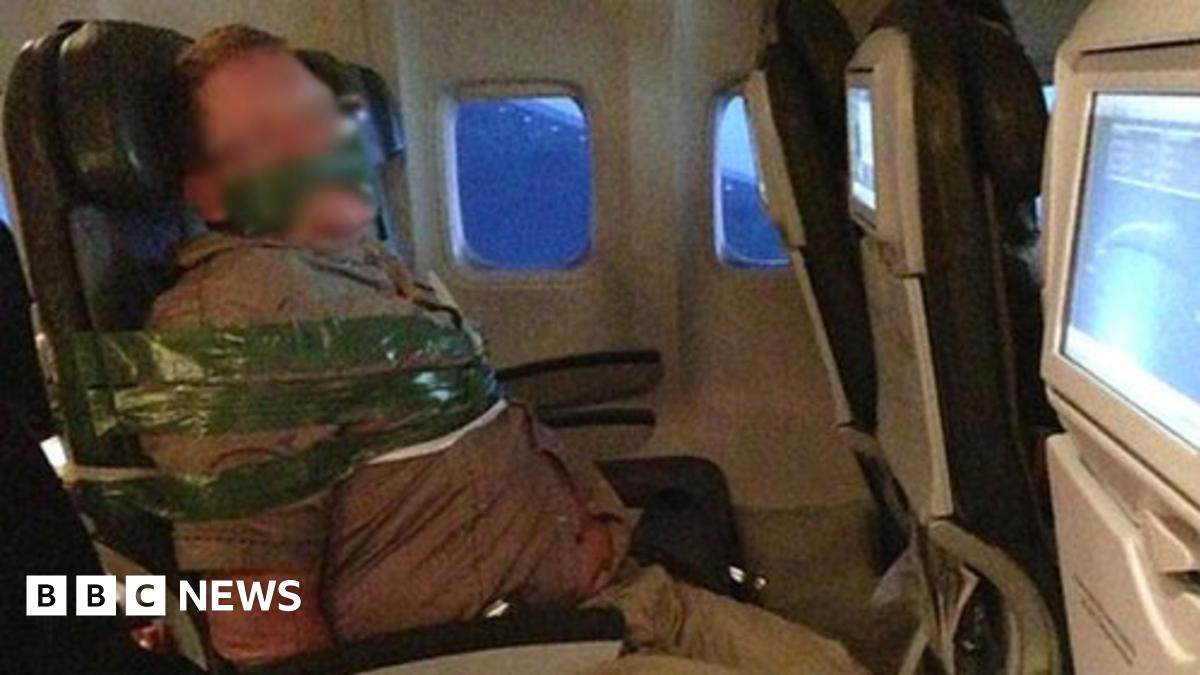 Who, What, Why: Is it legal to restrain air passengers? - BBC News