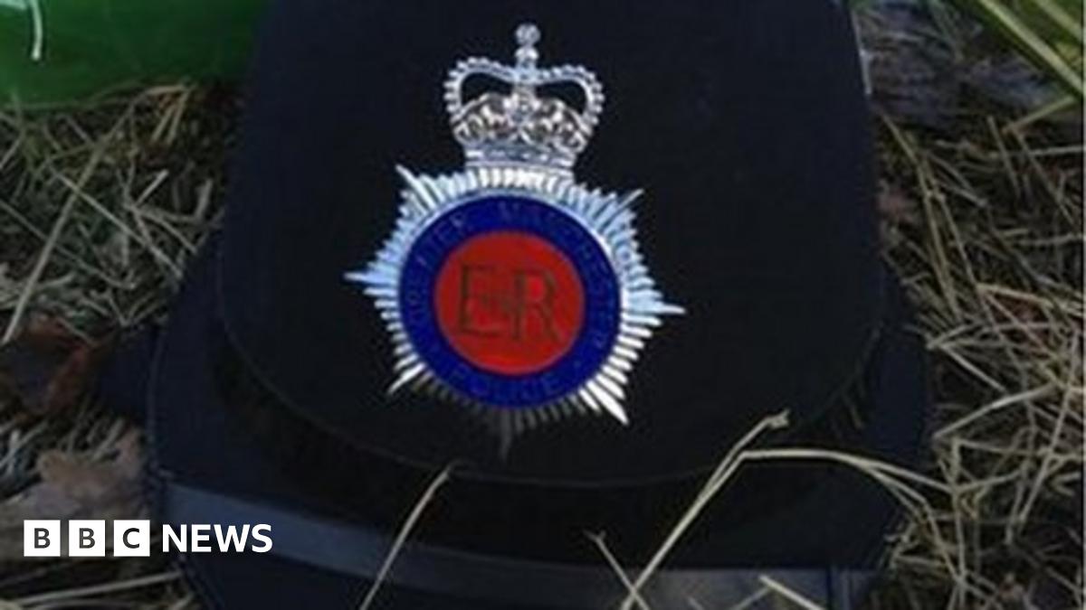 Rochdale officers pay respects to PC Andrew Bramma - BBC News