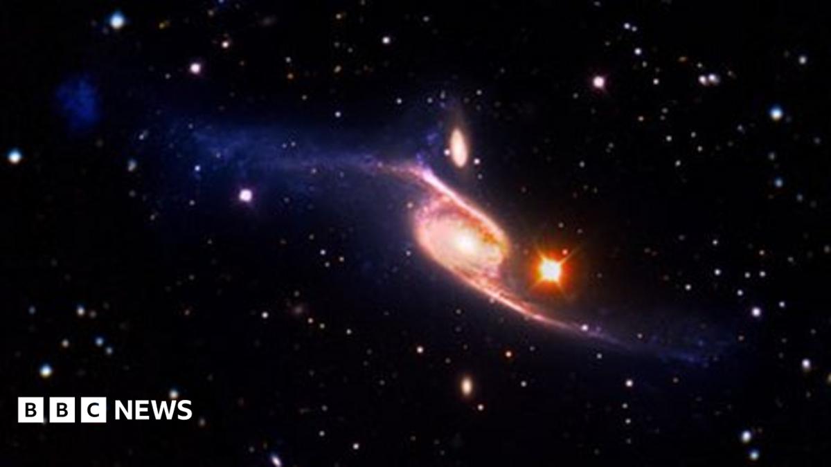 Galaxy crash sparks biggest spiral - BBC News
