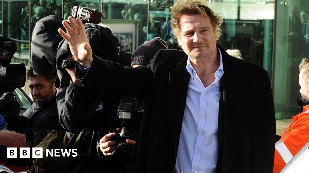 Liam Neeson arrives in Ballymena to receive award - BBC News