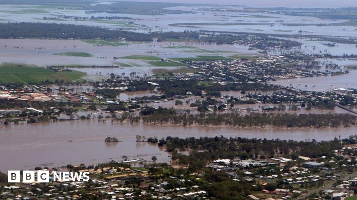 Rescuers help Australia flood victims as waters recede - BBC News
