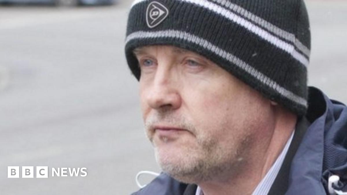 Teacher Russell Singleton jailed for spying on girls in bathroom - BBC News