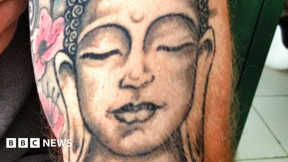Briton denies Buddha tattoo was 'disrespectful' - BBC News