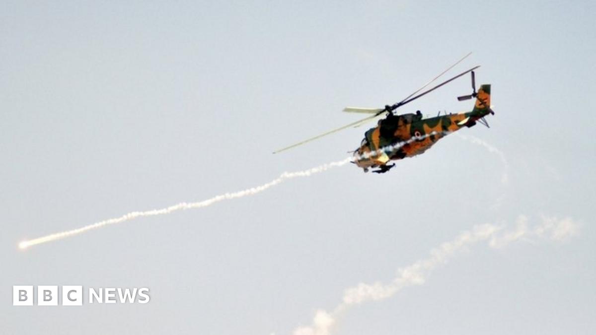 Syrian helicopter fires rockets 'inside Lebanon' - BBC News